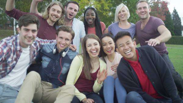 Happy close group of friends in natural outdoor setting. - 4K Royalty ...