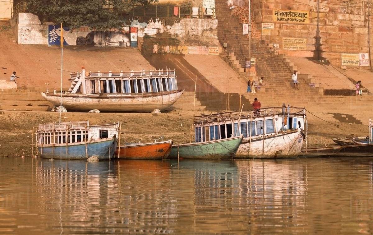 Boats In Varanasi - Stock Photo - Dissolve