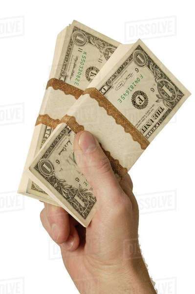 Holding Stacks Of Money - Royalty-free Stock Photo | Dissolve