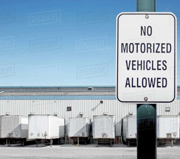 No Motorized Vehicles Allowed Sign In Front Of Truck Loading Bays ...