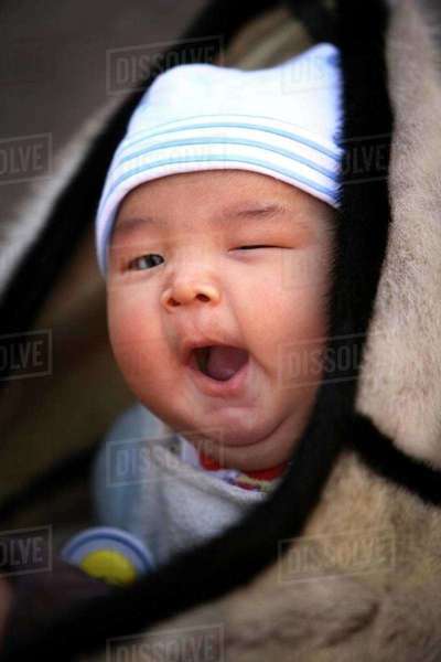 Baby Yawning - Stock Photo - Dissolve