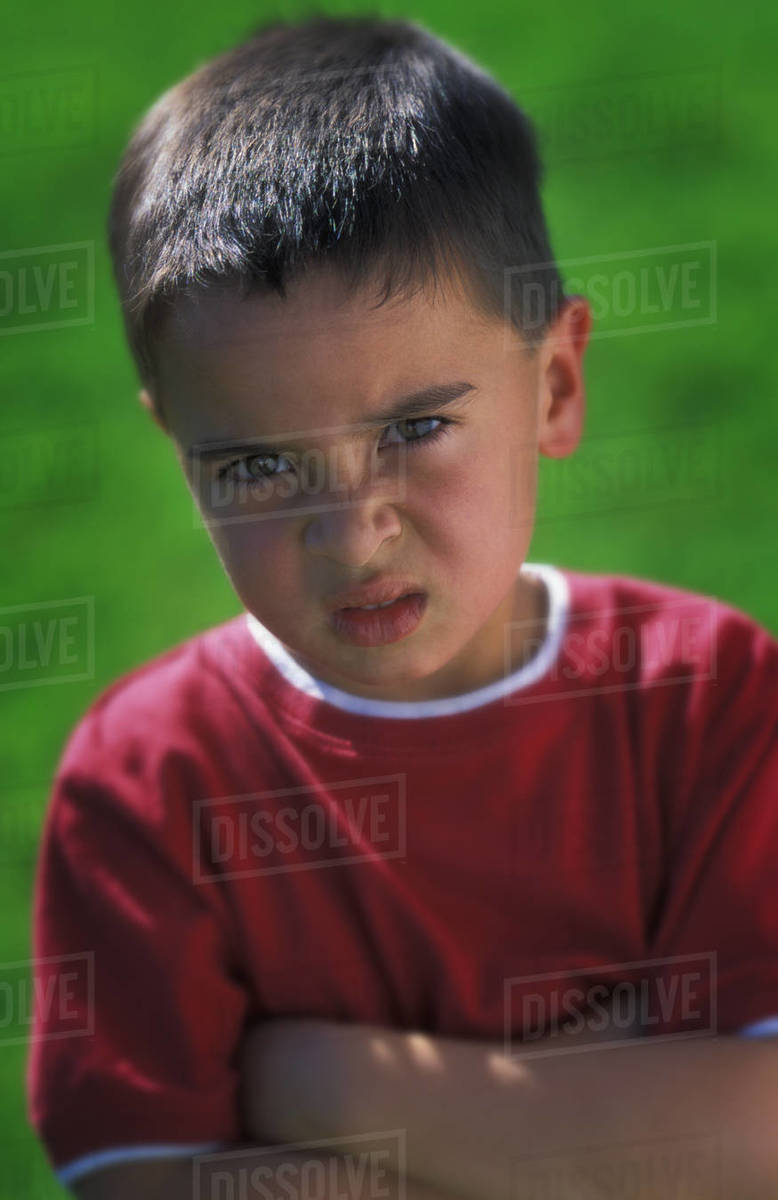 Boy Frowns - Stock Photo - Dissolve