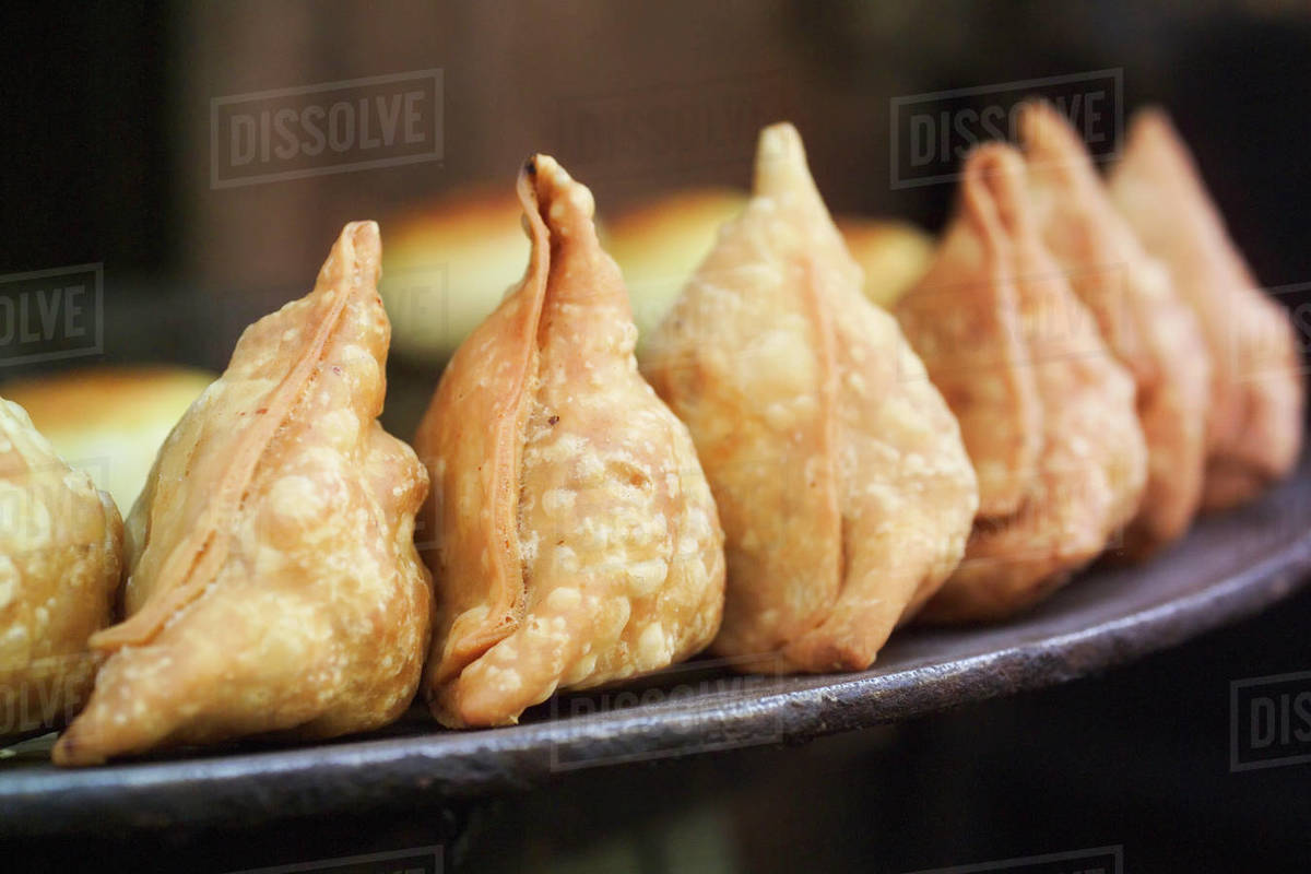 Fried Samosas On Plate,Close Up, Jaipur,Rajasthan,India - Stock Photo ...