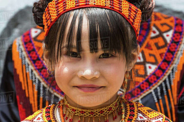 Girl In Traditional Torajan Dress Attending A Funeral Ceremony At A ...