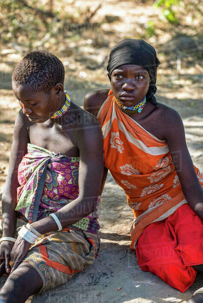 Young Hadzabe women in colourful clothing near Lake Eyasi; Tanzania ...