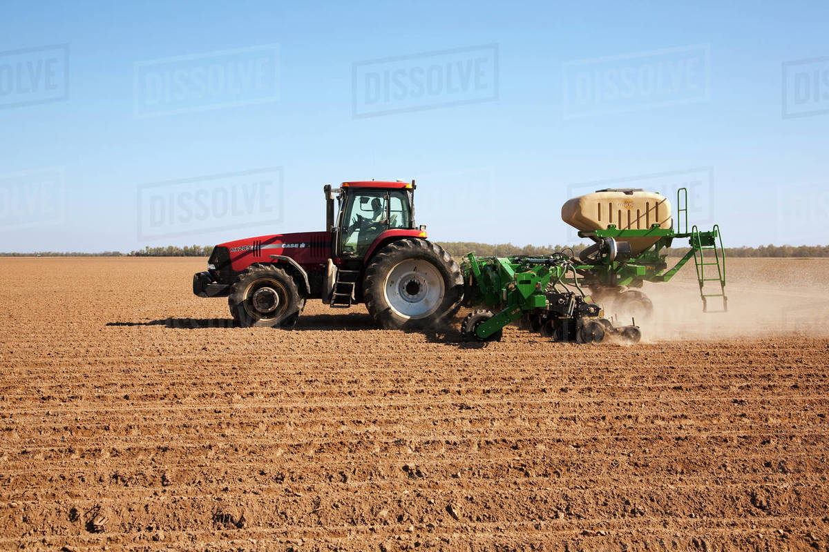 Agriculture - A Case IH tractor and Great Plains 40-foot twin row ...