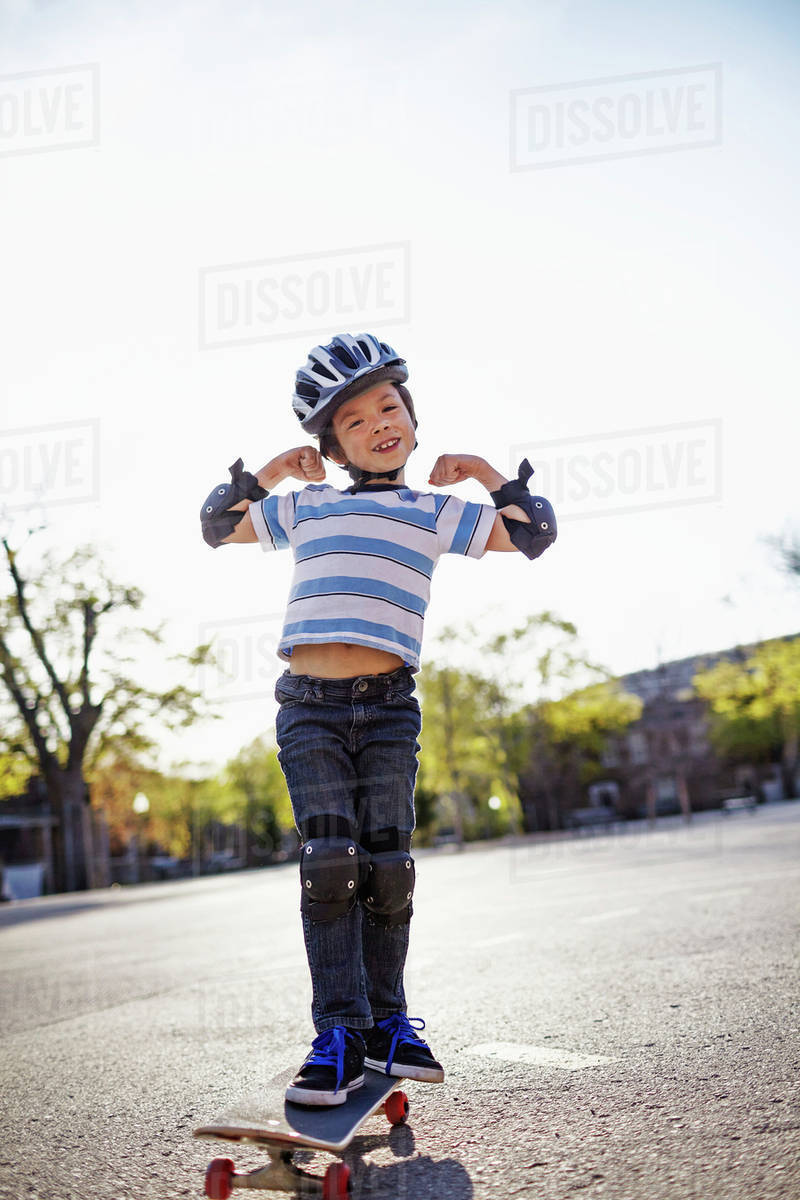 Young boy riding a skateboard; Montreal, Quebec, Canada - Royalty-free ...