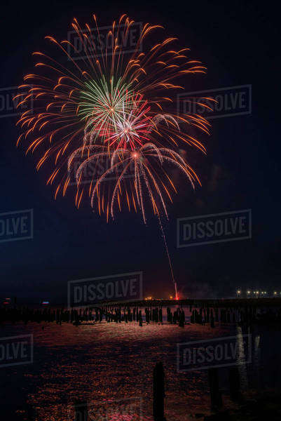 A fireworks display celebrates July 4th; Astoria, Oregon, United States ...