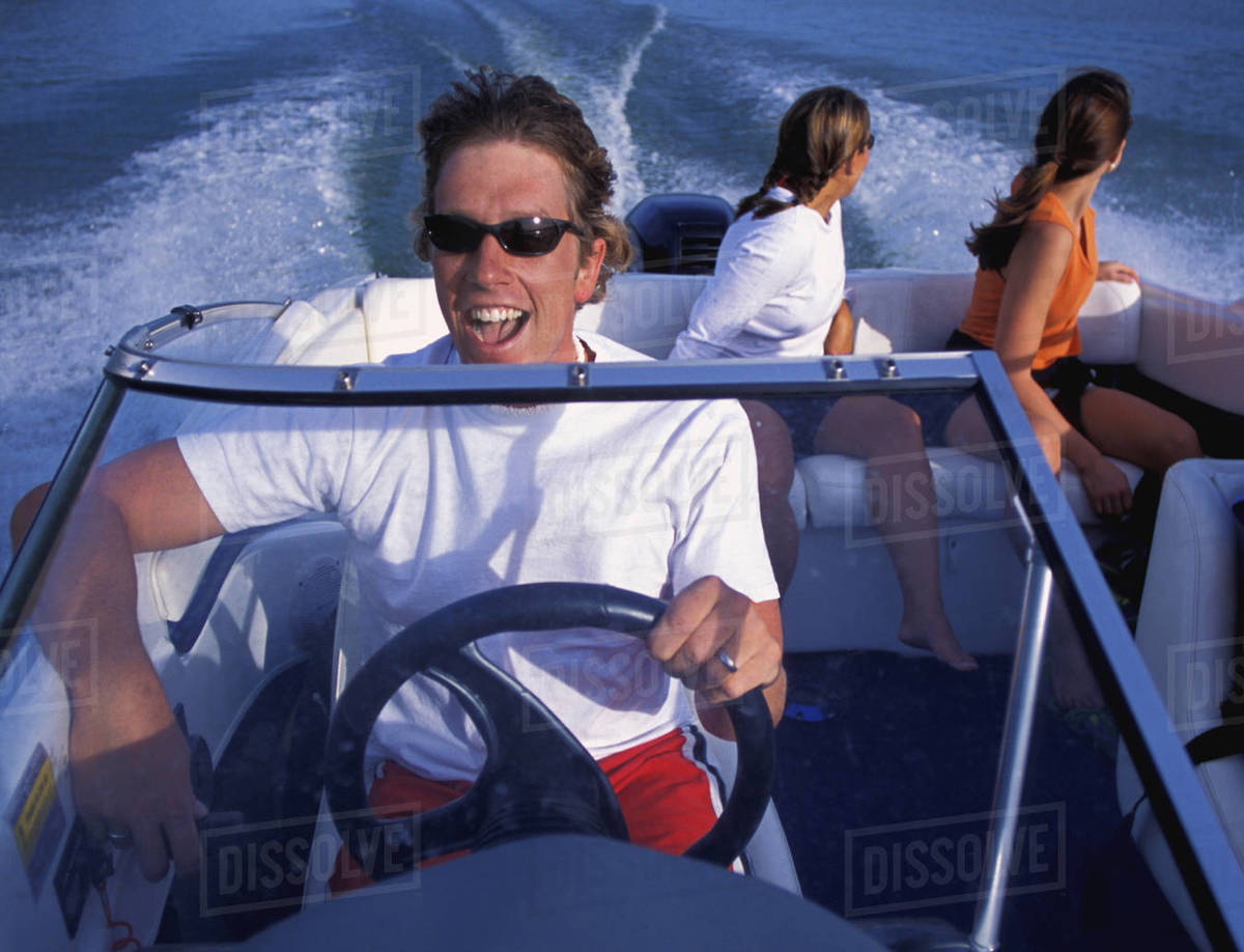 People On Speedboat - Stock Photo - Dissolve