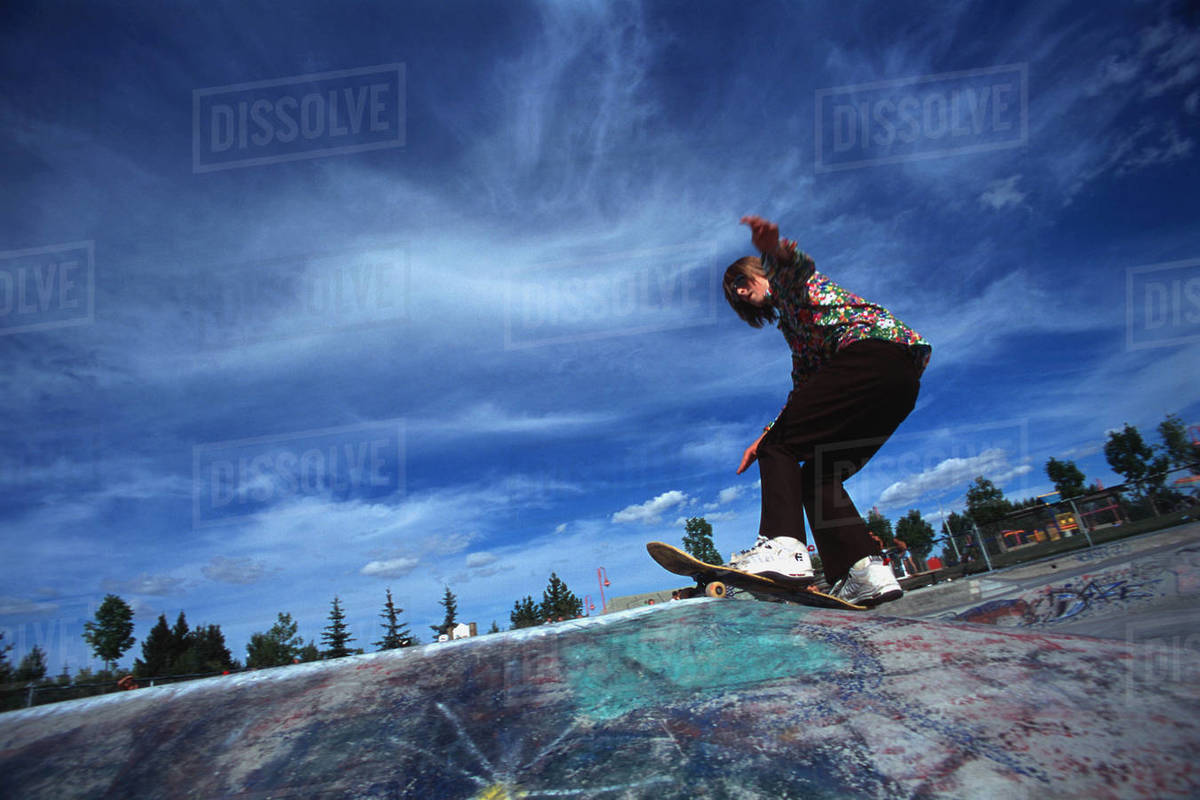 Boarder Performing Stunt At Skate Park - Royalty-free Stock Photo ...