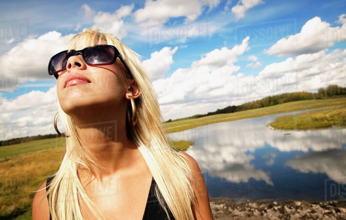 Portrait Of Woman In The Sun - Royalty-free Stock Photo | Dissolve