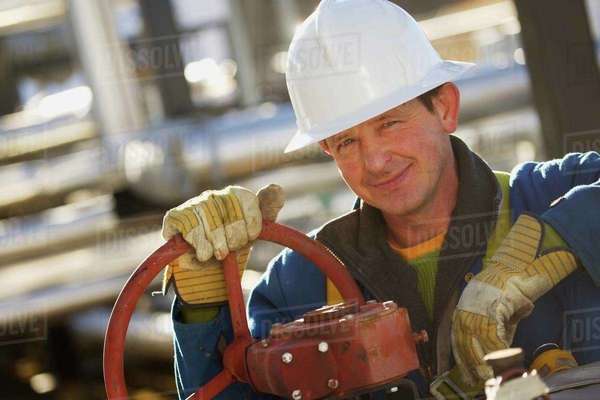Oil Refinery Worker - Stock Photo - Dissolve