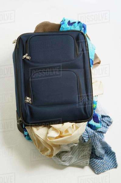 An Over-Stuffed Suitcase - Royalty-free Stock Photo | Dissolve