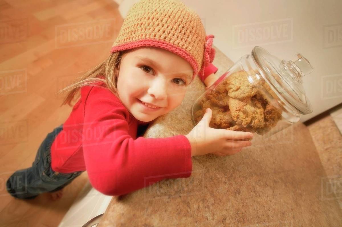 Child With Cookie Jar - Royalty-free Stock Photo | Dissolve