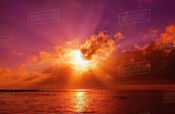 Breathtaking Sunset Over Water - Royalty-free Stock Photo | Dissolve