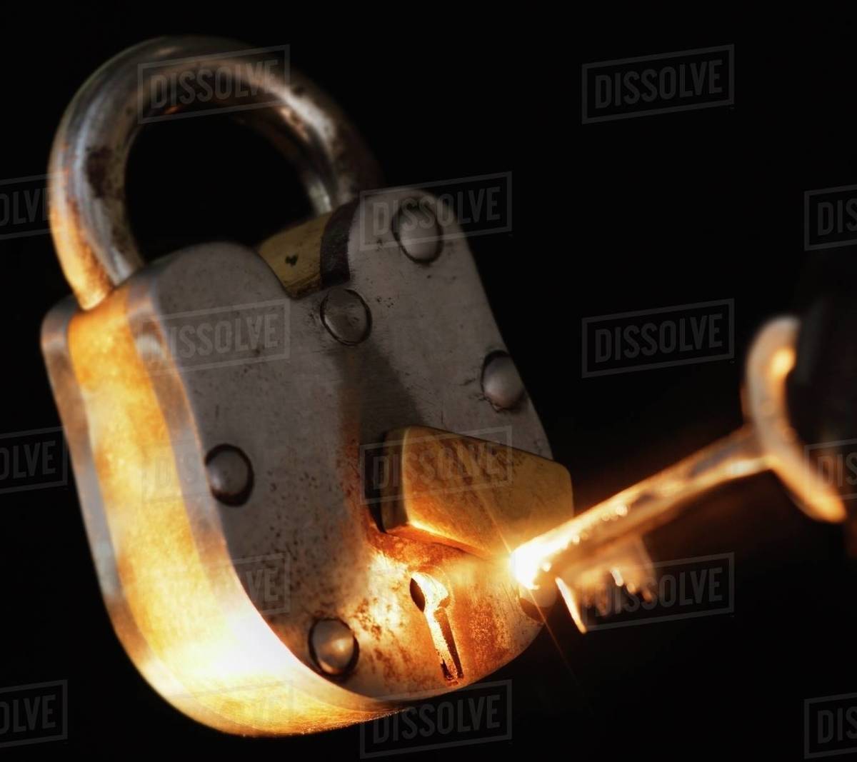 Lock And Key - Stock Photo - Dissolve