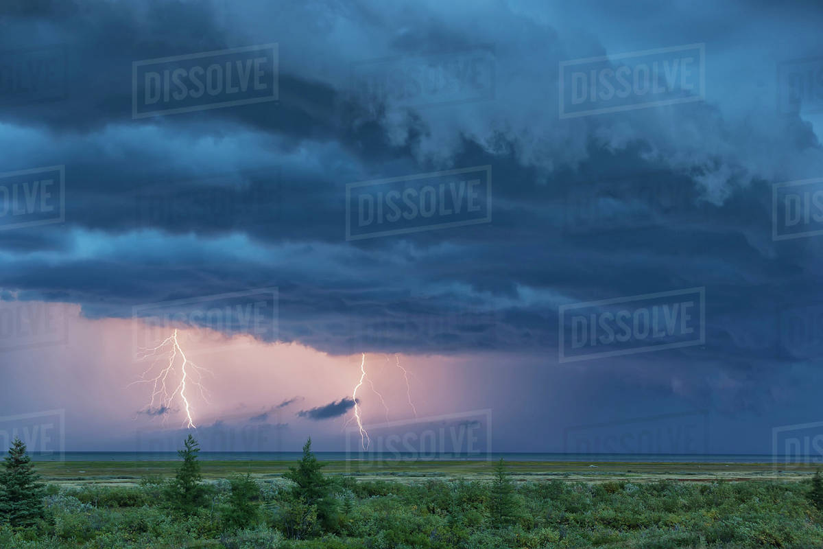 Double lightning strike during a thunderstorm over Hudson bay; Manitoba ...