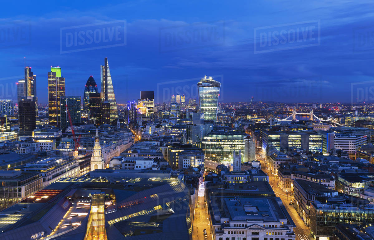Cityscape of London with various buildings in the skyline at dusk ...