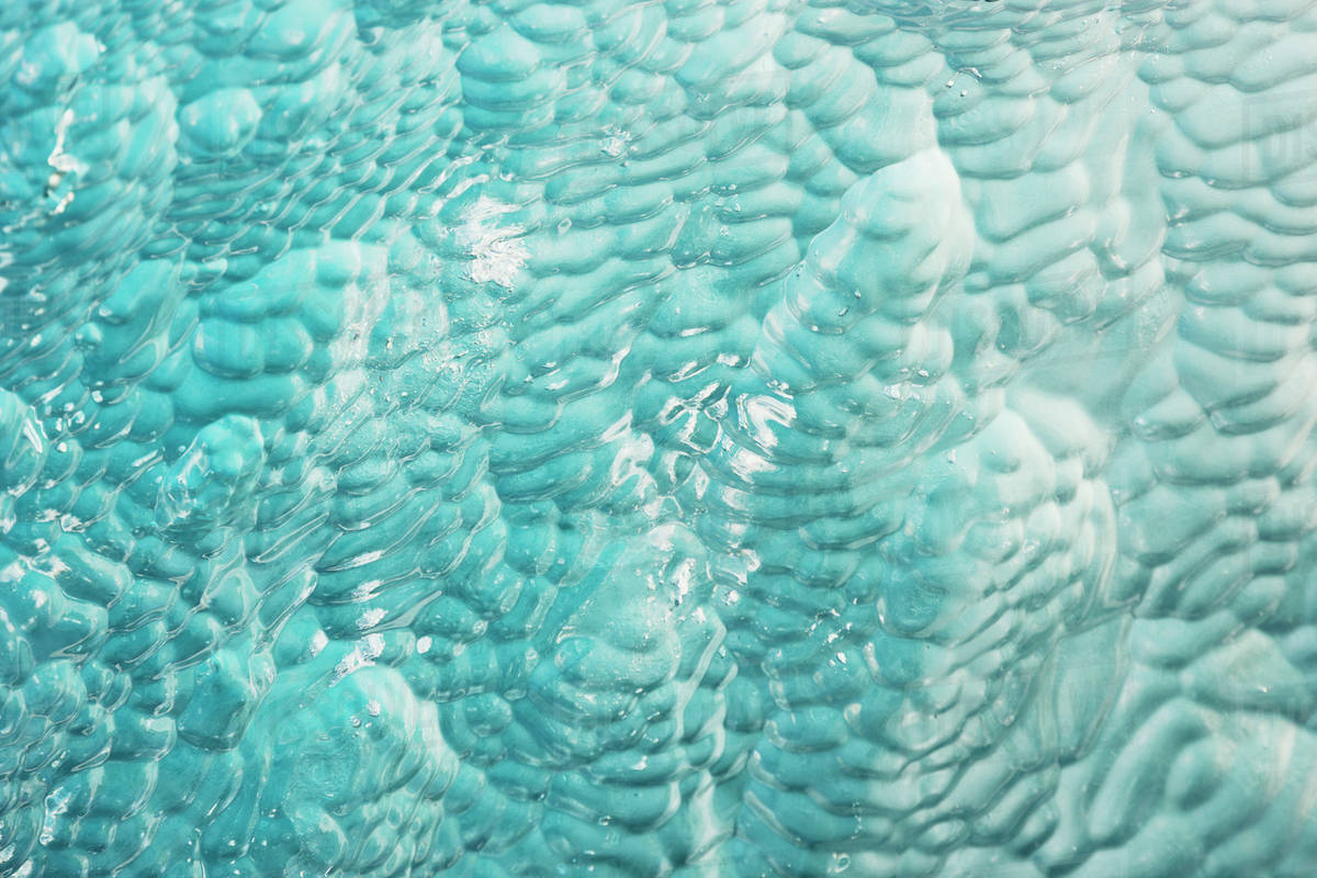 Close up of ice surface of iceberg broken off Mendenhall Glacier ...