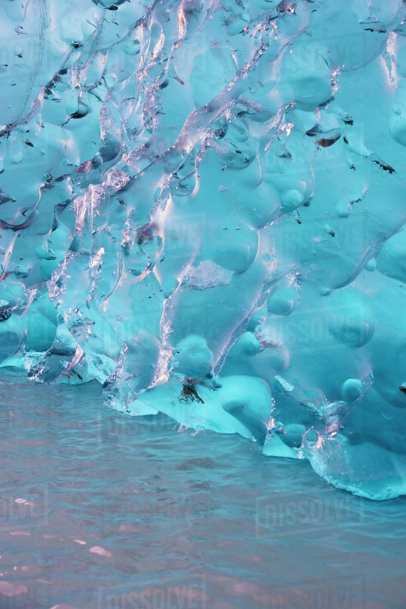 Close up of ice surface of iceberg broken off Mendenhall Glacier ...