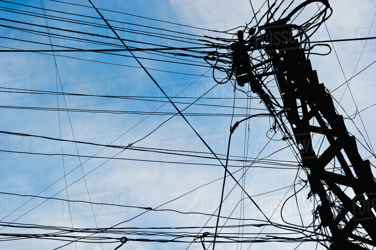 Electrical wires jumbled from a transmitter on a tower; Beirut, Lebanon ...