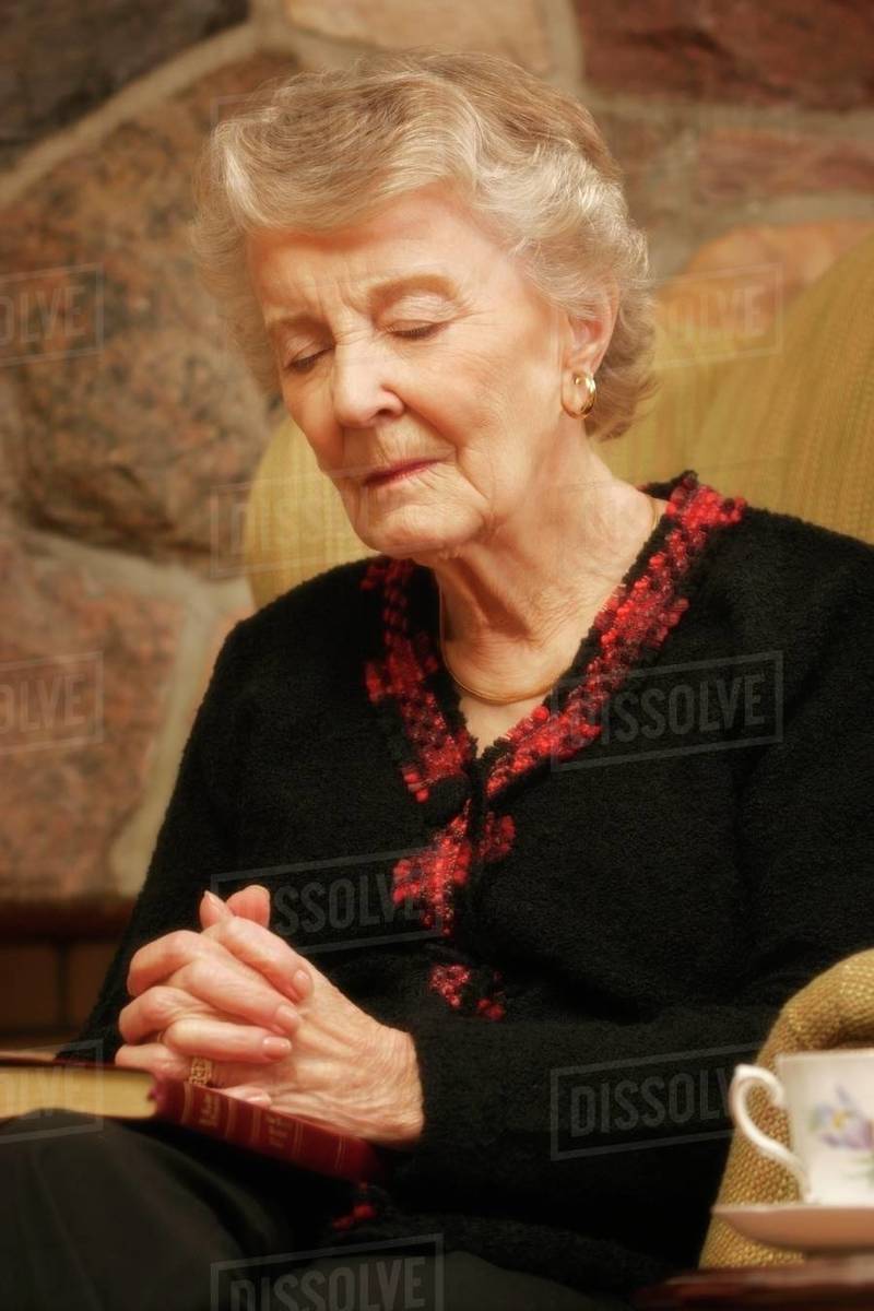 Senior Lady Praying - Royalty-free Stock Photo | Dissolve