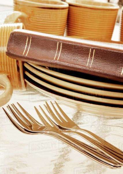 Bible With Dinnerware - Stock Photo - Dissolve