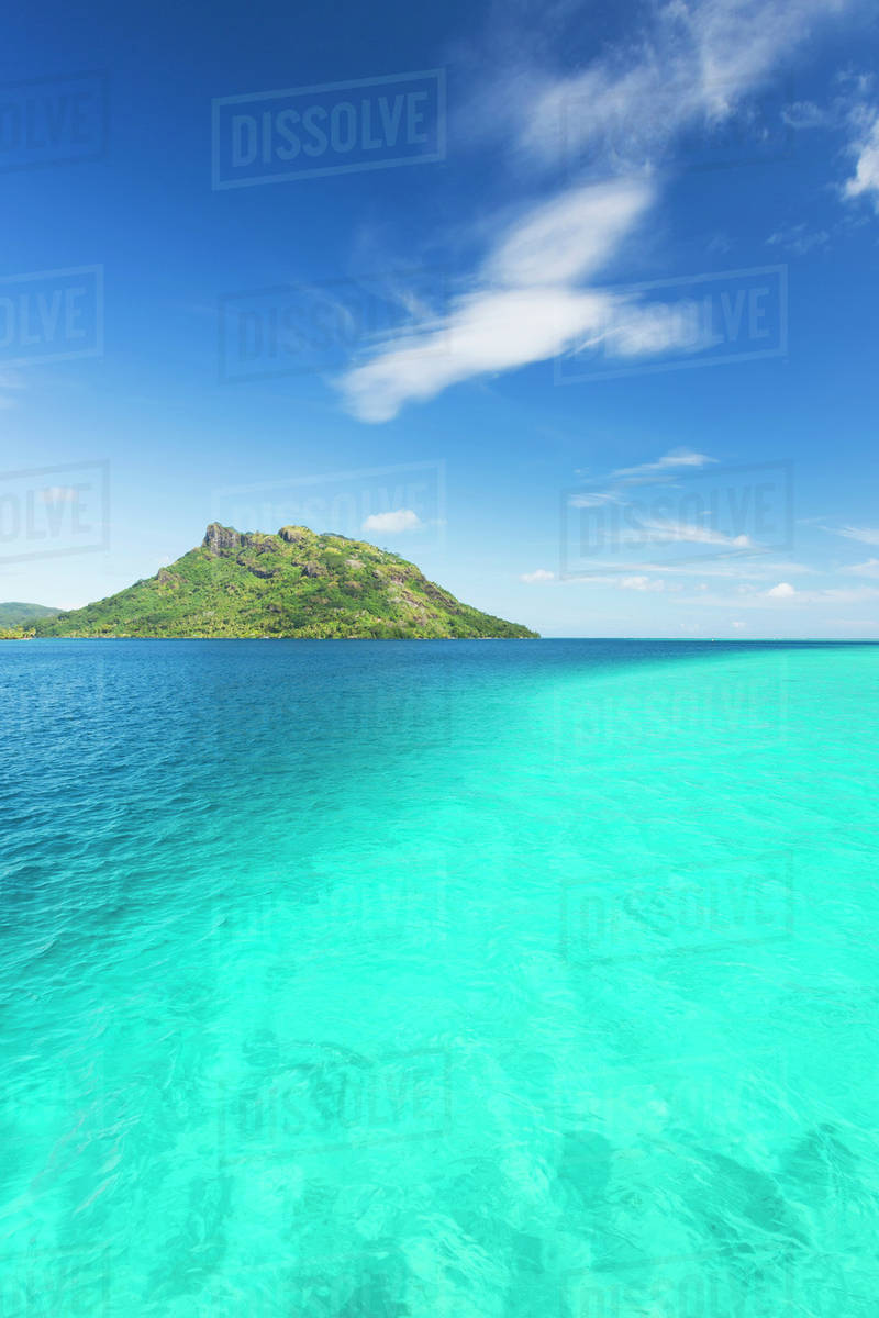 Lagoon and tropical blue water; Huahine, French Polynesia - Stock Photo ...