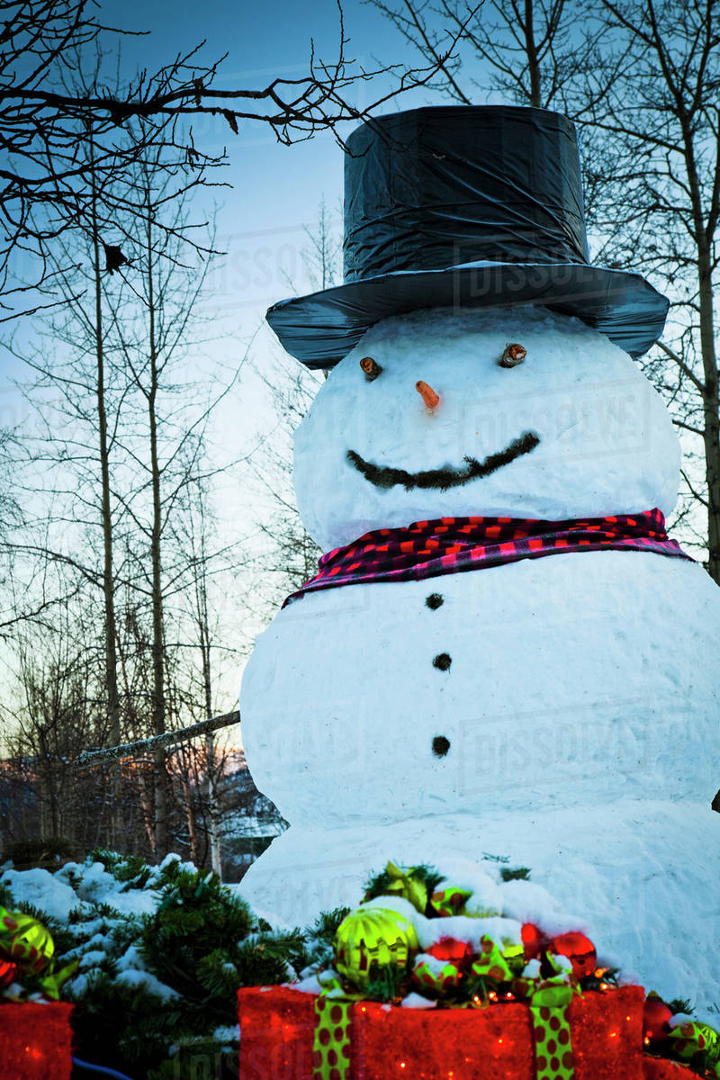 A huge snowman and Christmas gift boxes at Chena Hot Springs Resort ...