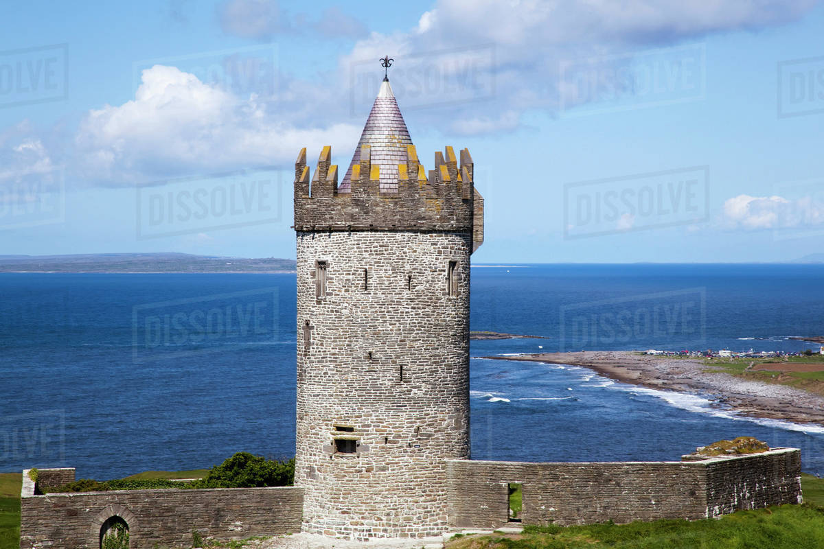 Doonagore castle, a round 16th-century tower house with a small walled ...