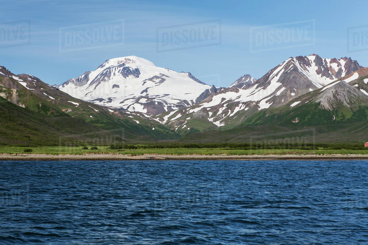 View Of The Mountains Along The Coastline; False Pass, Alaska, United ...