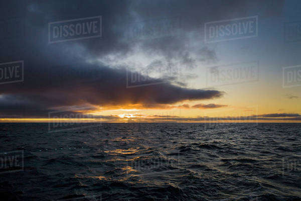 Sunrise Over The Pacific Ocean Near Unimak Island; Alaska, United ...