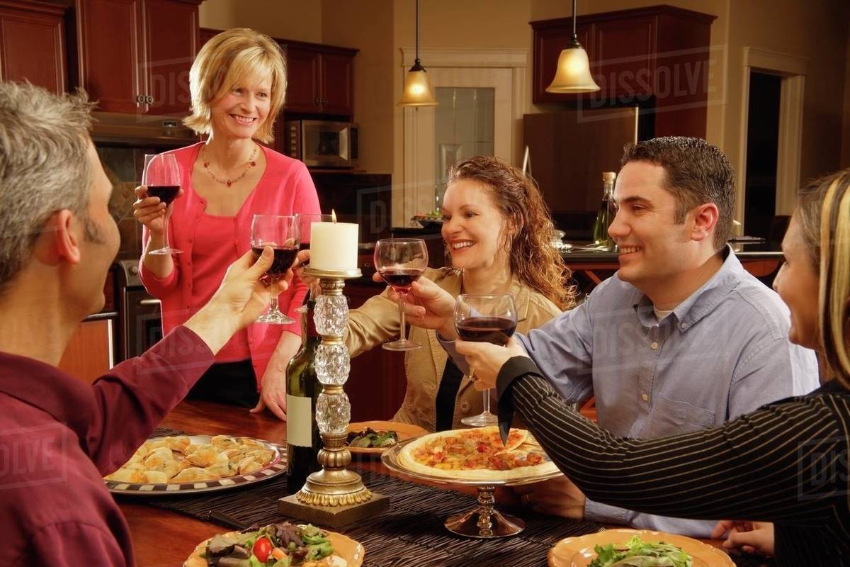 Group Having Dinner Together - Royalty-free Stock Photo | Dissolve