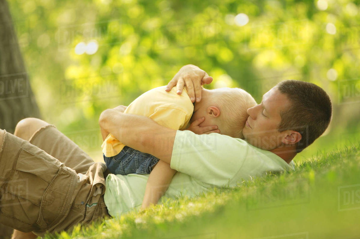 Father Comforting Son - Royalty-free Stock Photo | Dissolve