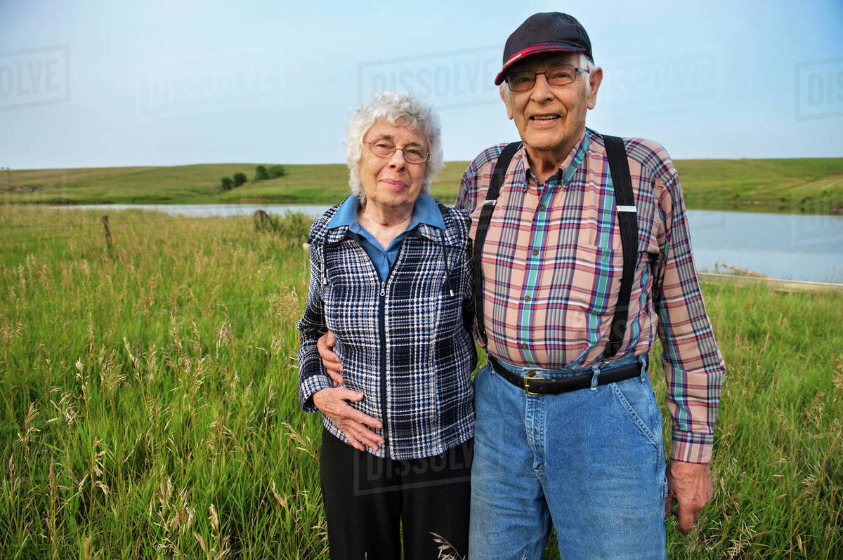 Outdoor portrait of a senior couple in the countryside; Loma, Nebraska ...
