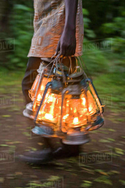 Carrying lighted kerosene lamps; Kenya - Royalty-free Stock Photo ...