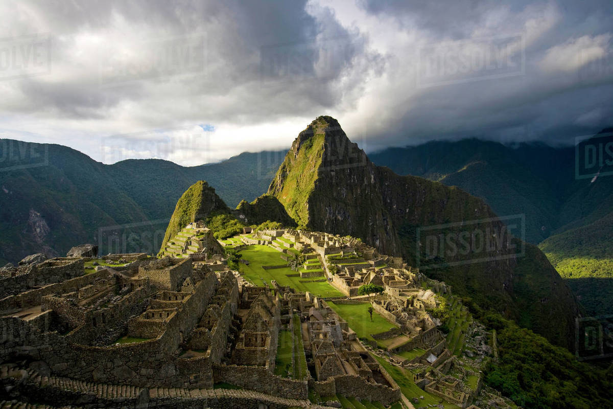 Reconstructed stone buildings on Machu Picchu; Peru - Royalty-free ...