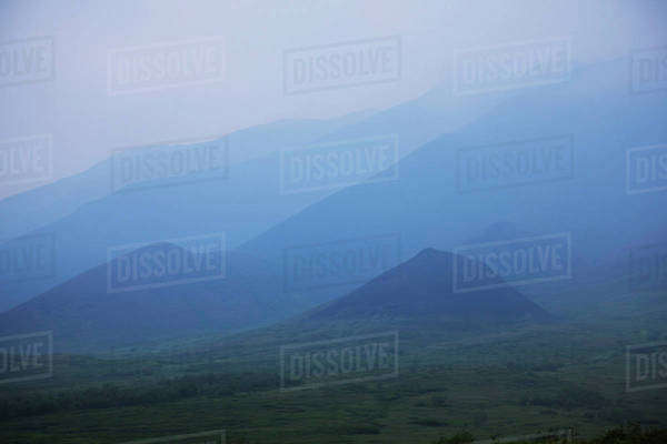 Smoke From A Forest Fire Creates A Blue Haze That Partially Obscures ...