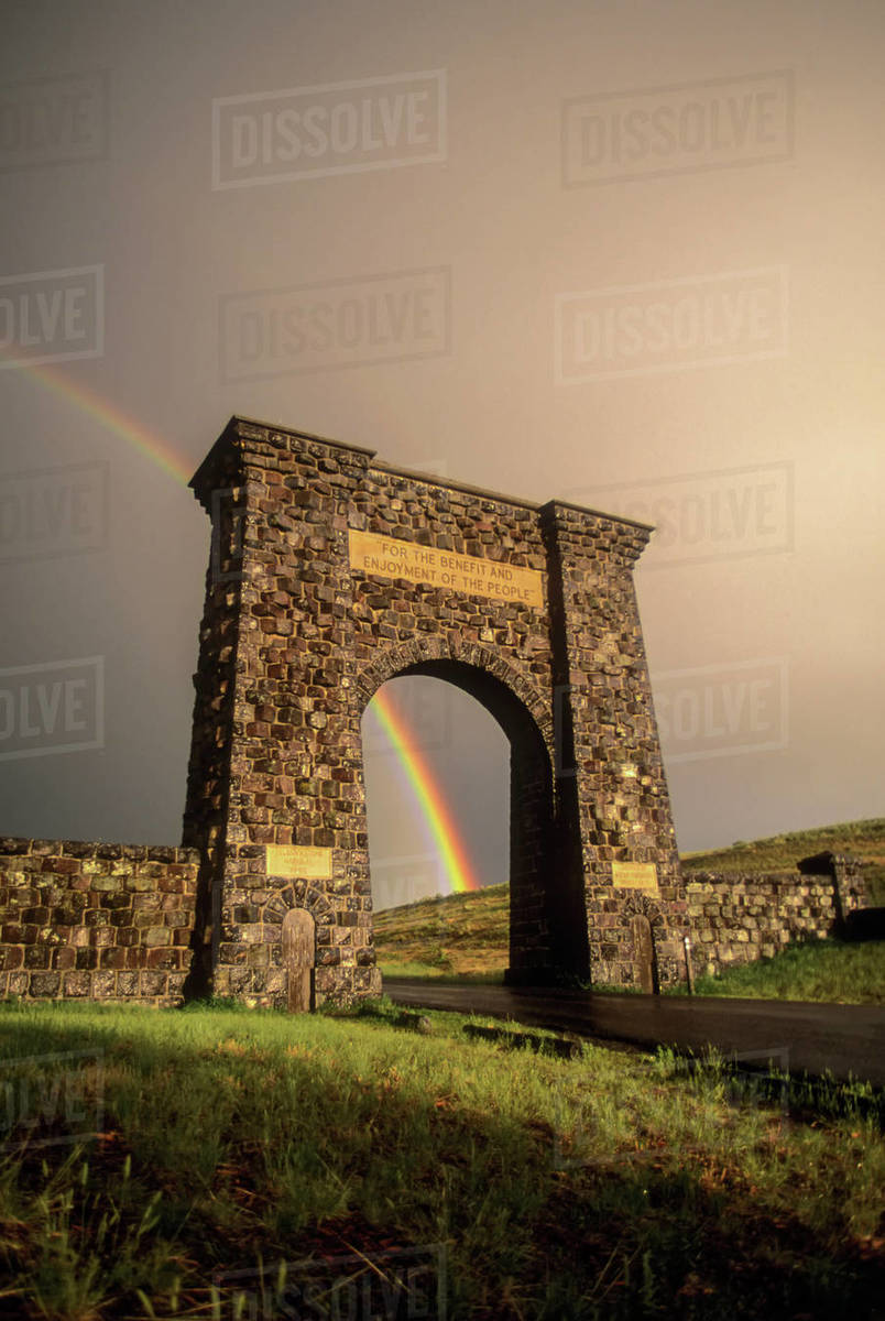 The Roosevelt Arch, built from rough blocks of columnar basalt, which ...