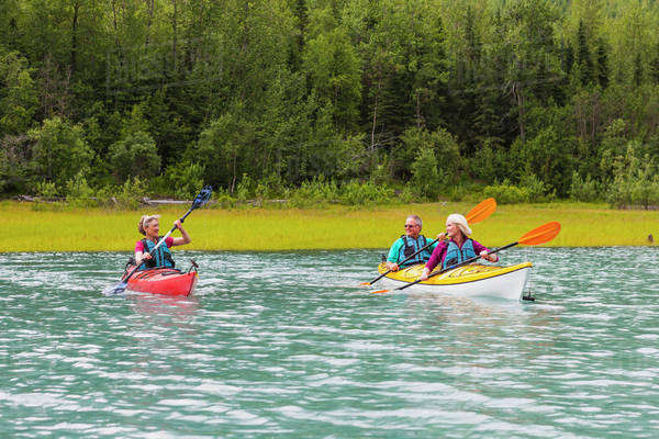 Recreational kayak touring in Eklutna Lake, Chugach State Park; Alaska ...