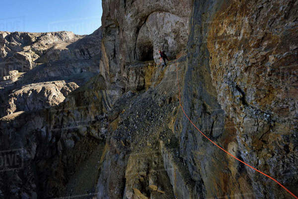 One level on a cliff face containing three caves remained illusive. The ...