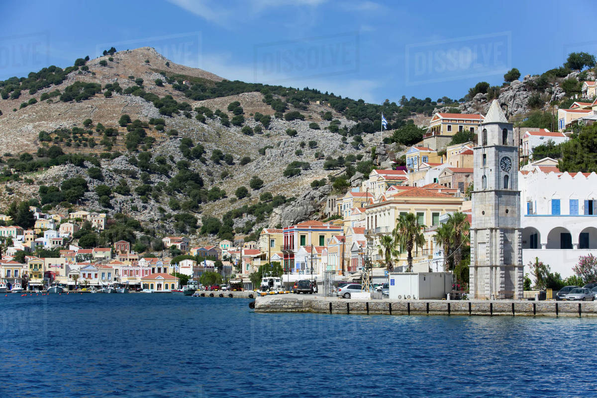 Symi Clock Tower on the waterfront at Gialos Harbor, Symi (Simi) Island ...