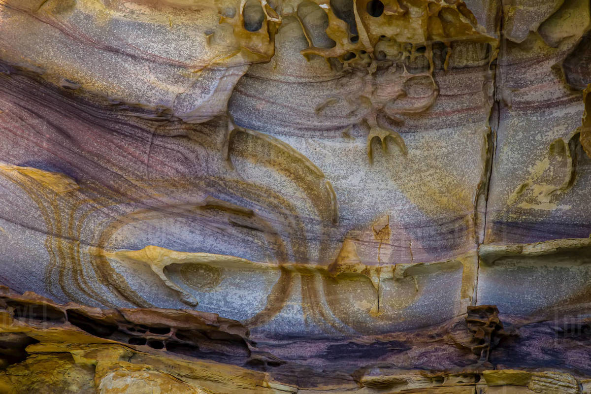 A cross-section of sandstone layers from the Precambrian Era near King ...