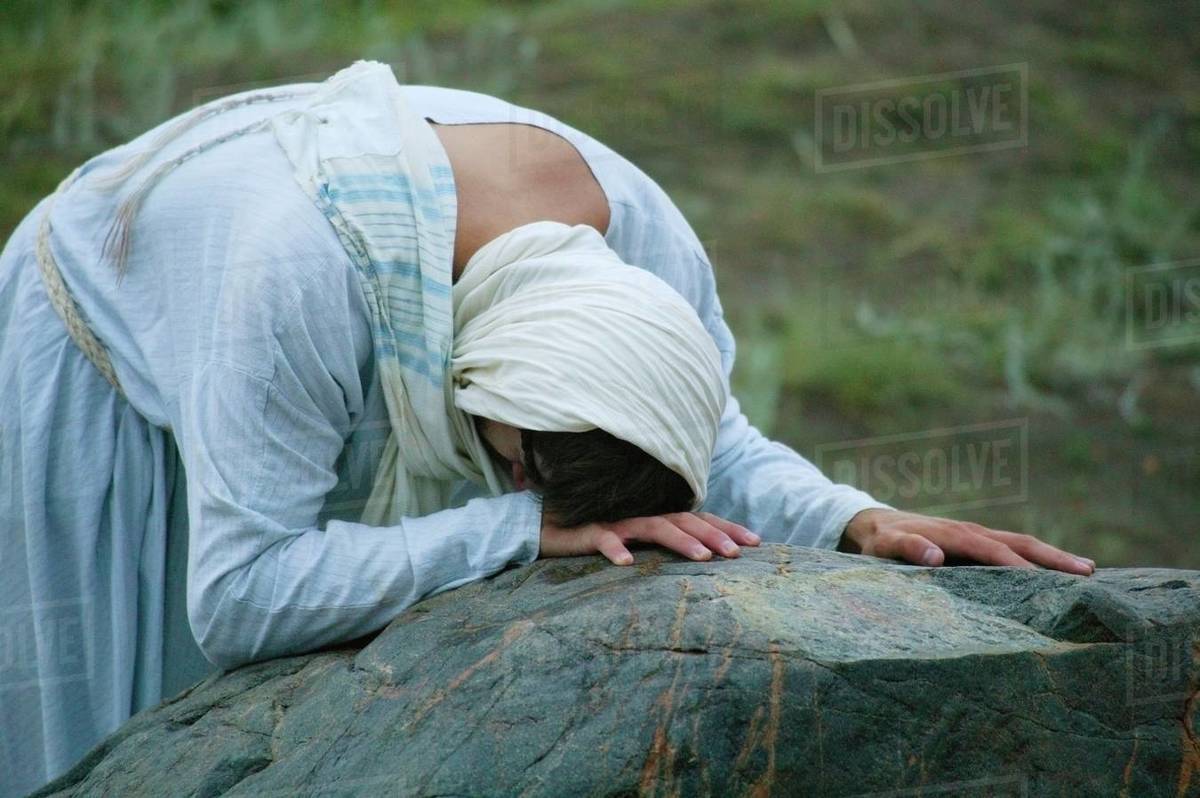Crying And Praying - Stock Photo - Dissolve