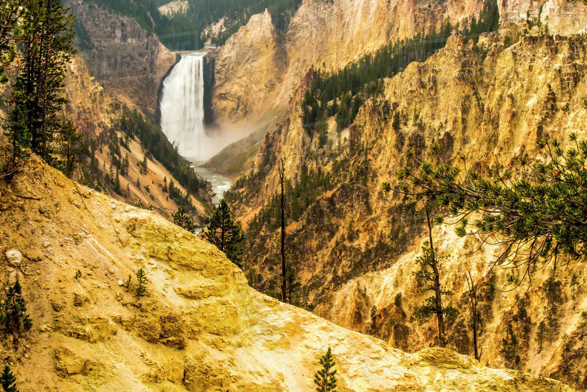 Lower Falls of the Yellowstone River and the yellow sulphuric rock ...