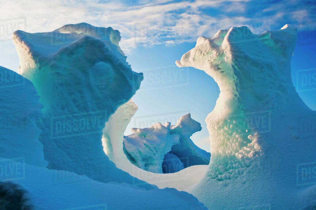 Unique iceberg formations with sunlight and shadows; Antarctica ...