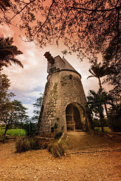 Old windmill on the grounds of the Damoiseau Distillery, remains of ...