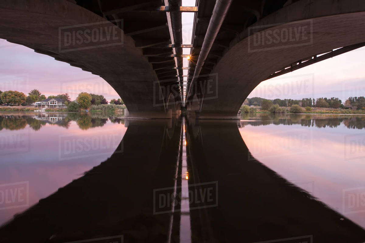 The underside of a bridge spanning the Yakima River, and the far ...