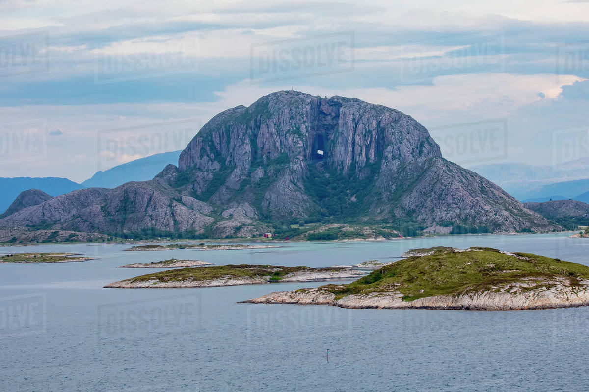The granite dome of Torghatten, known for the its hole through the ...