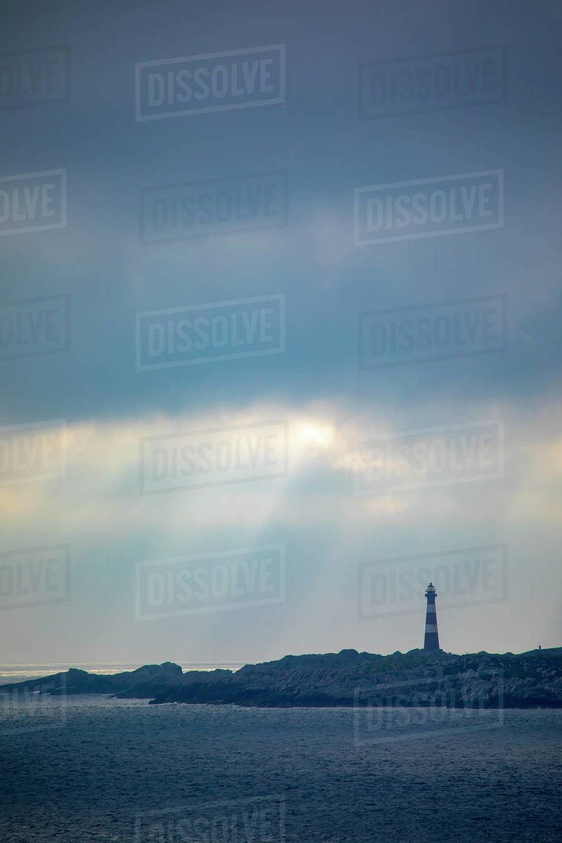 Hellisoy Lighthouse, a remote lighthouse on an island in the Western ...